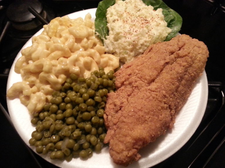 Fried Catfish with baked macaroni, green peas and potato salad ...