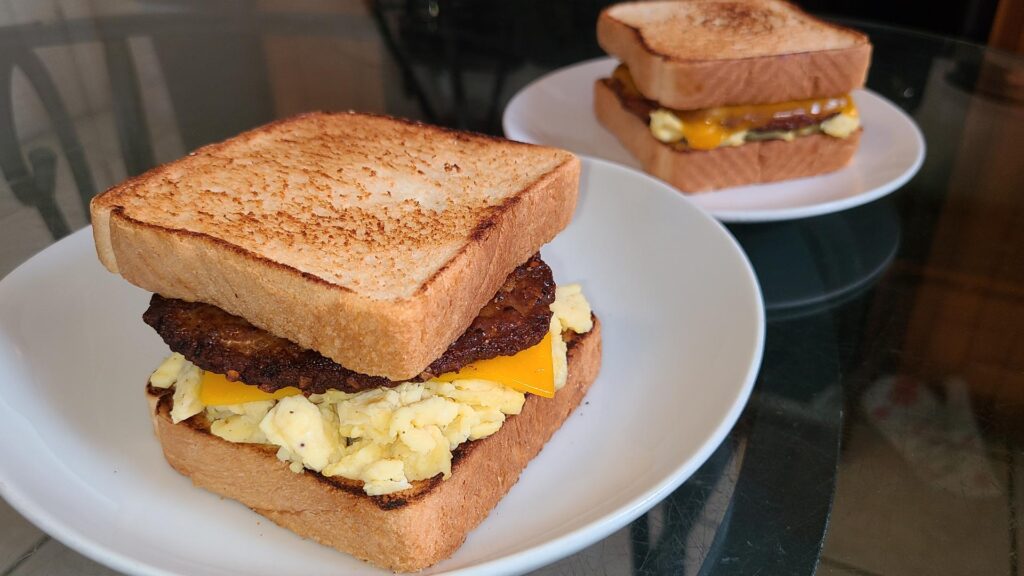 Hot sausage egg and cheese on toast breakfast sandwich ...